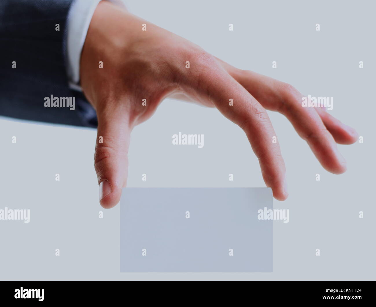 Man's hand showing business card Stock Photo - Alamy