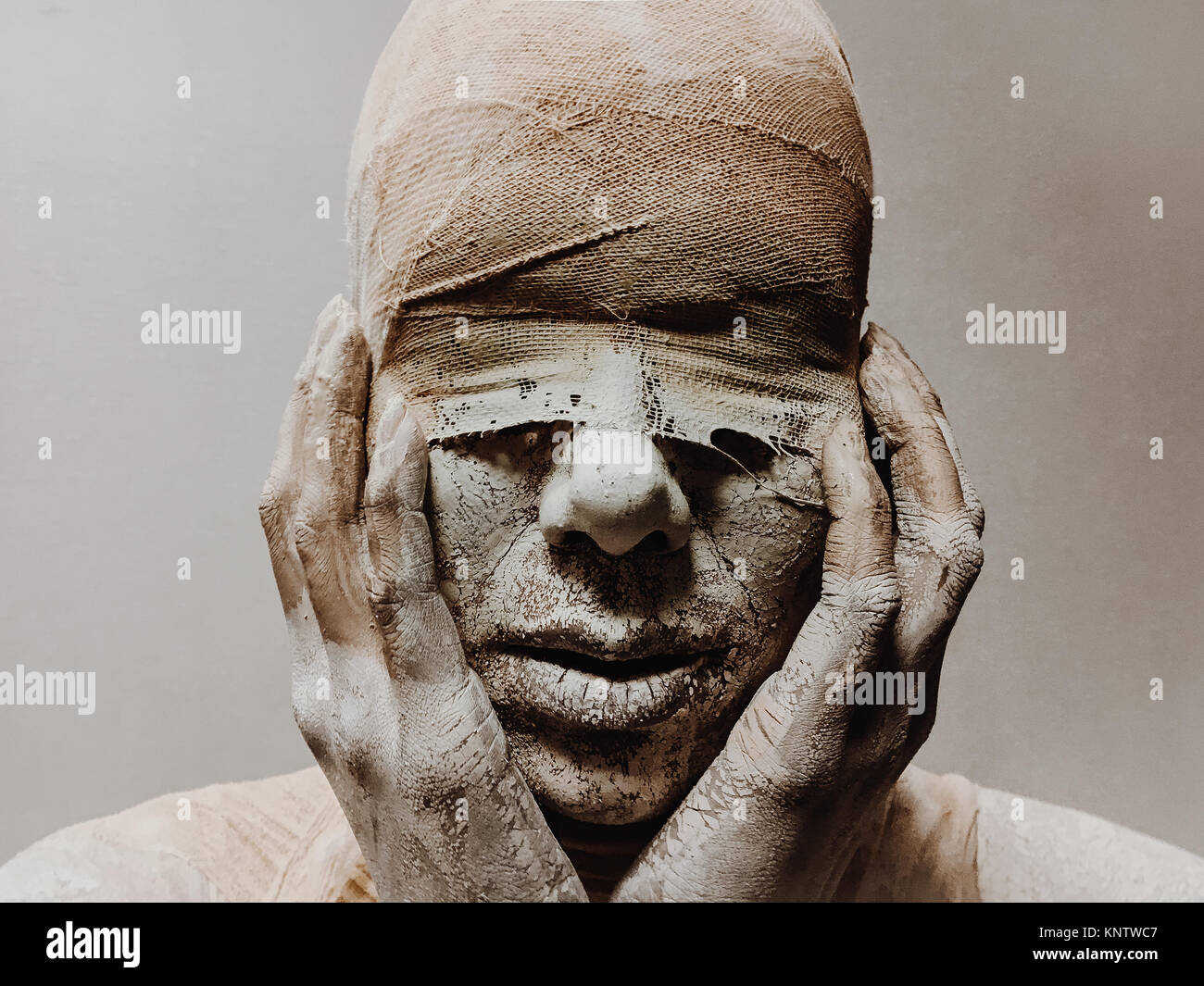 in makeup, a woman in bandages and clay is like a mummy without eyes on ...