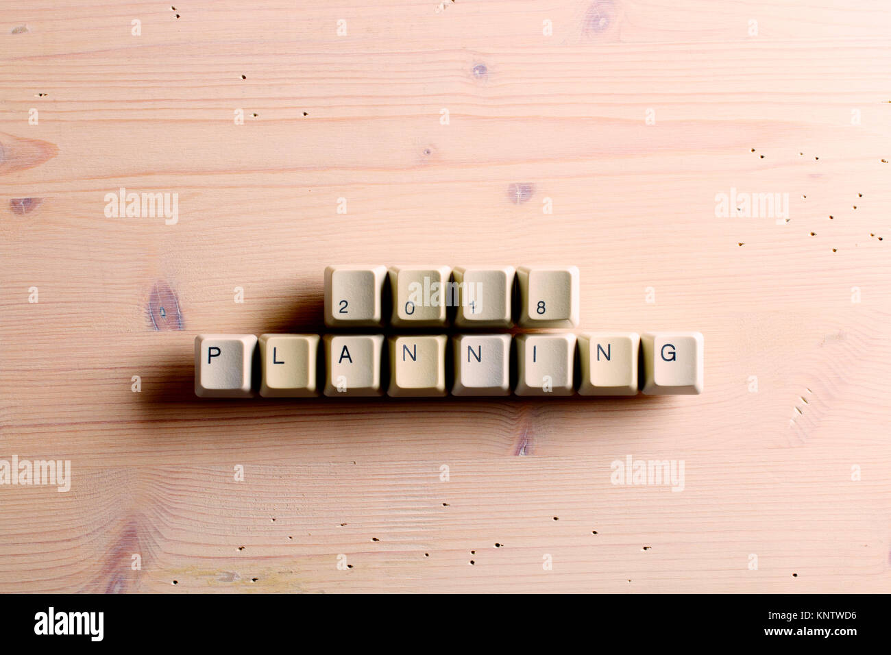 Planning 2018 new year. Flat lay view from above on the table with computer keyboard keys ...