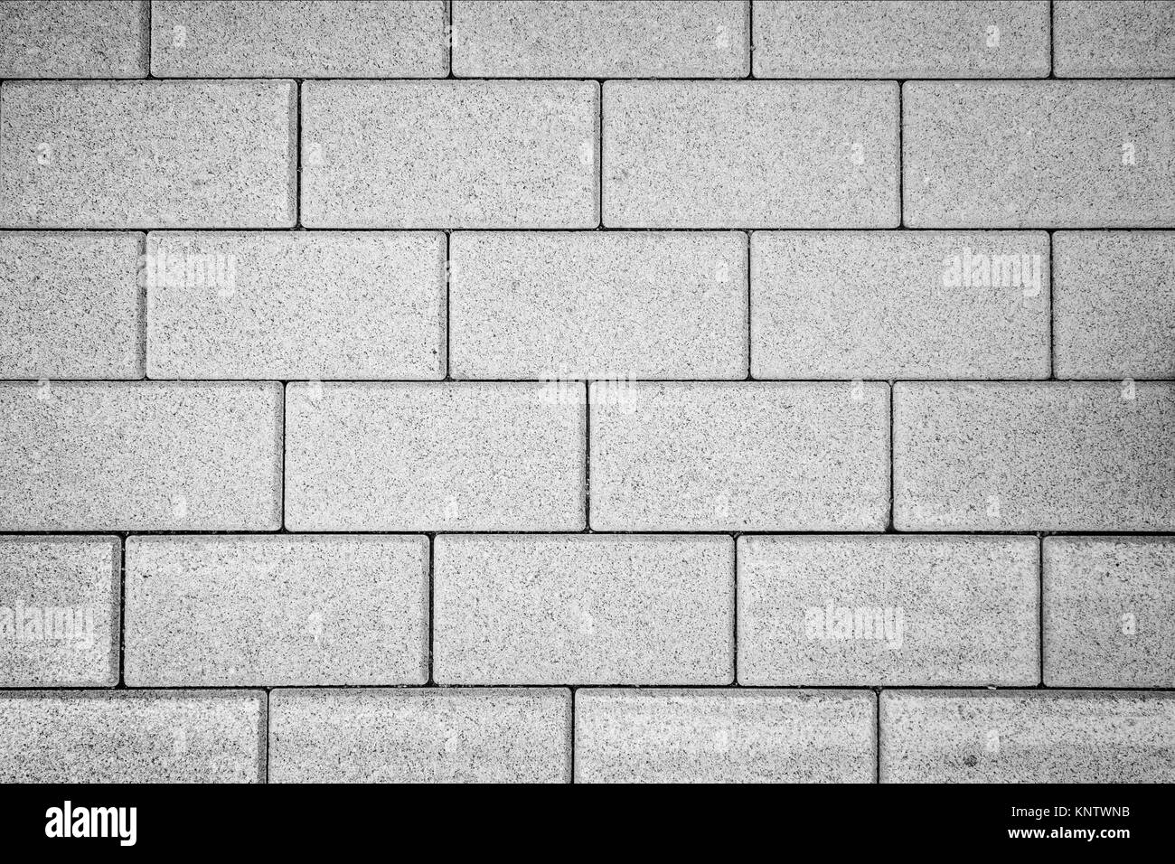 Pattern of paving blocks viewed from above in black and white with ...