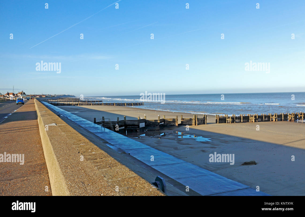 A view of the seawall and beach on a winter afternoon at Walcott ...