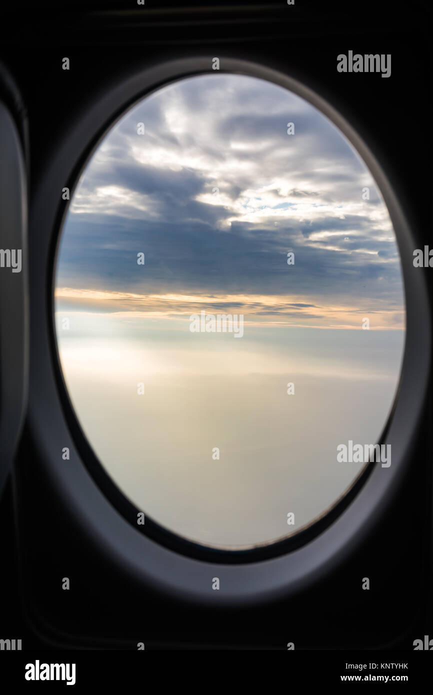 View of Foggy Overcast Clouds Sunlight Beams Rays Through Airplane ...