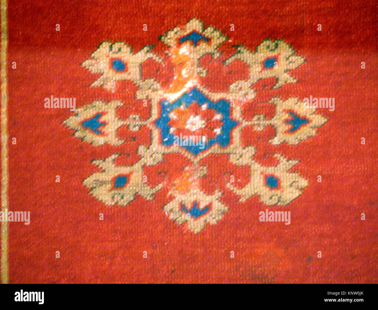 A 'Bellini' carpet featuring woven patterns, ornamental motifs, and ...