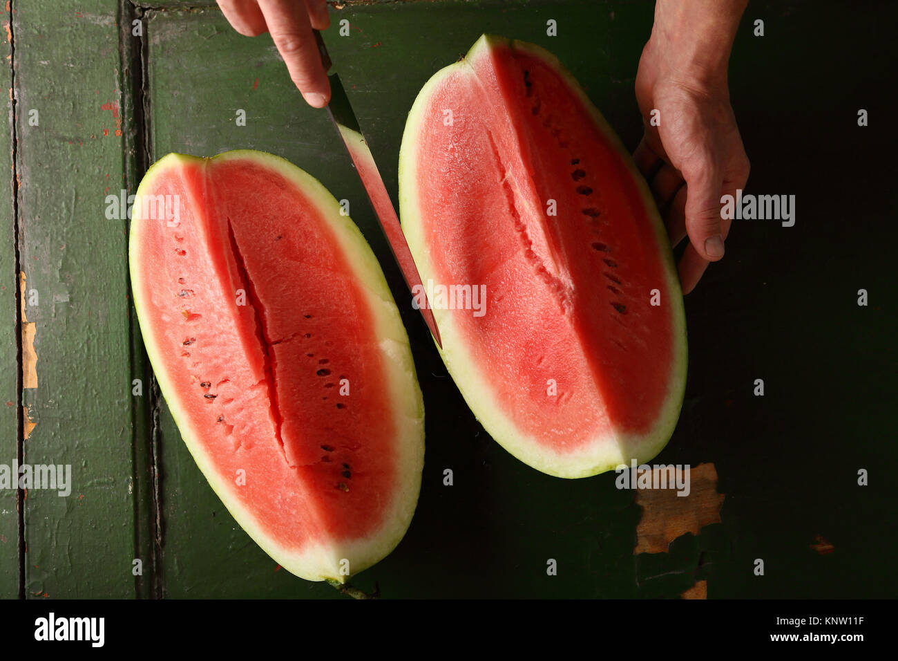 Two slices watermelon on green background, food above Stock Photo - Alamy