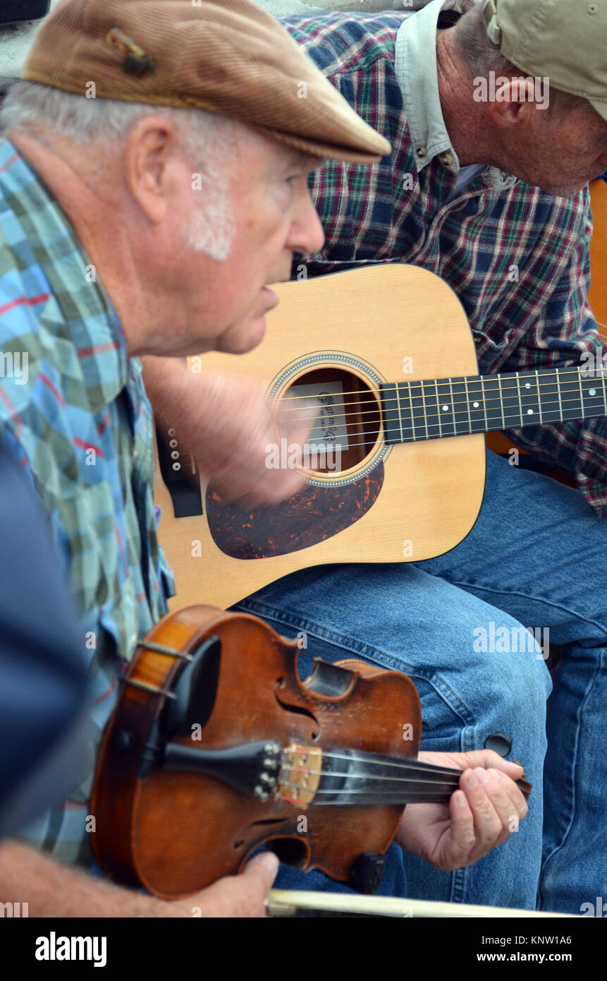 Musicians playing outside in the street at the Friday Night Jamboree at ...