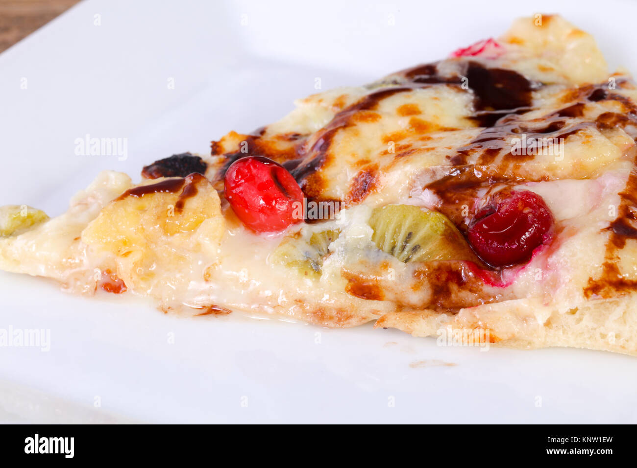 Sweet pizza with fruits and cheese Stock Photo - Alamy