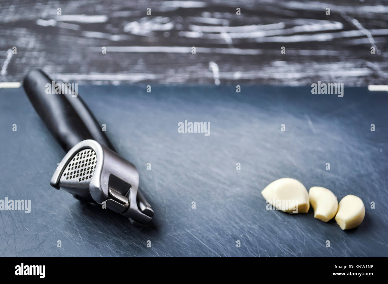 A composition of cloves of garlic on the table Stock Photo - Alamy