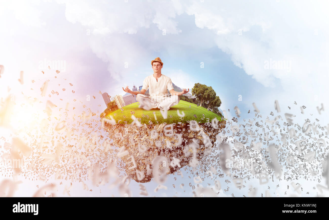 Young man keeping mind conscious Stock Photo - Alamy