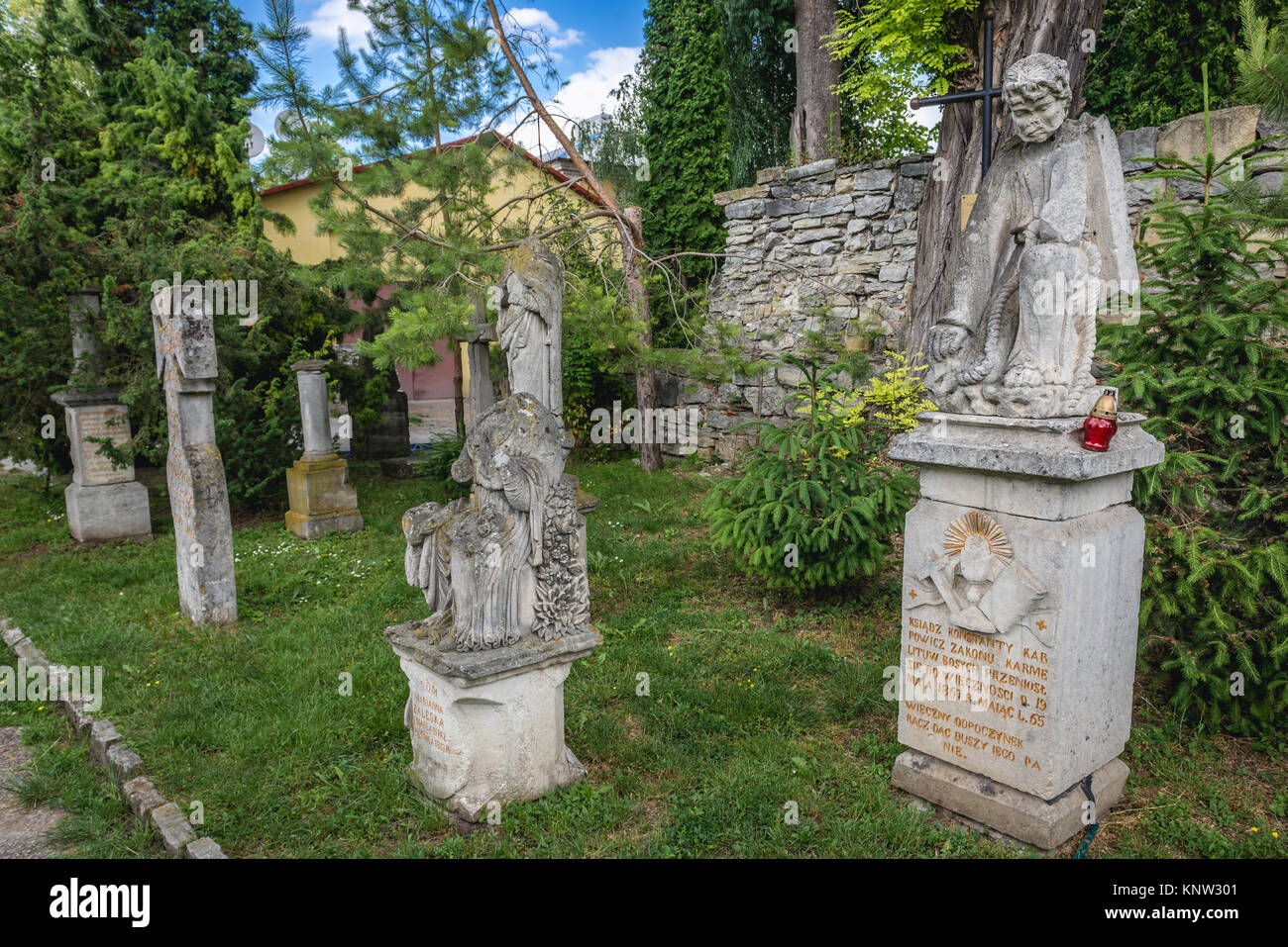 Old Polish graves on a cemetery next to Catholic Cathedral of Saints ...