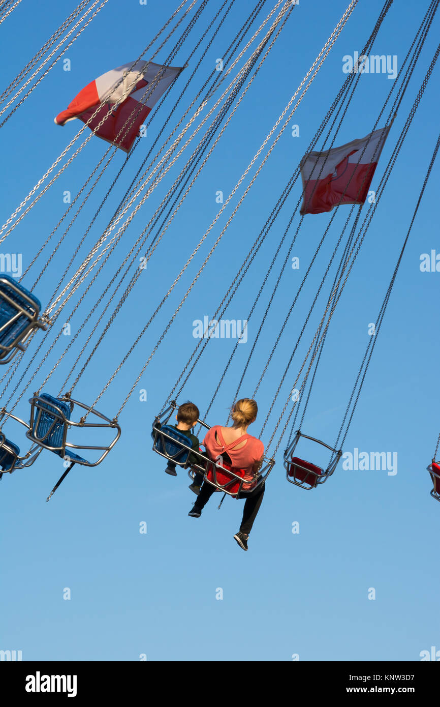 Child swinging legs hi-res stock photography and images - Alamy