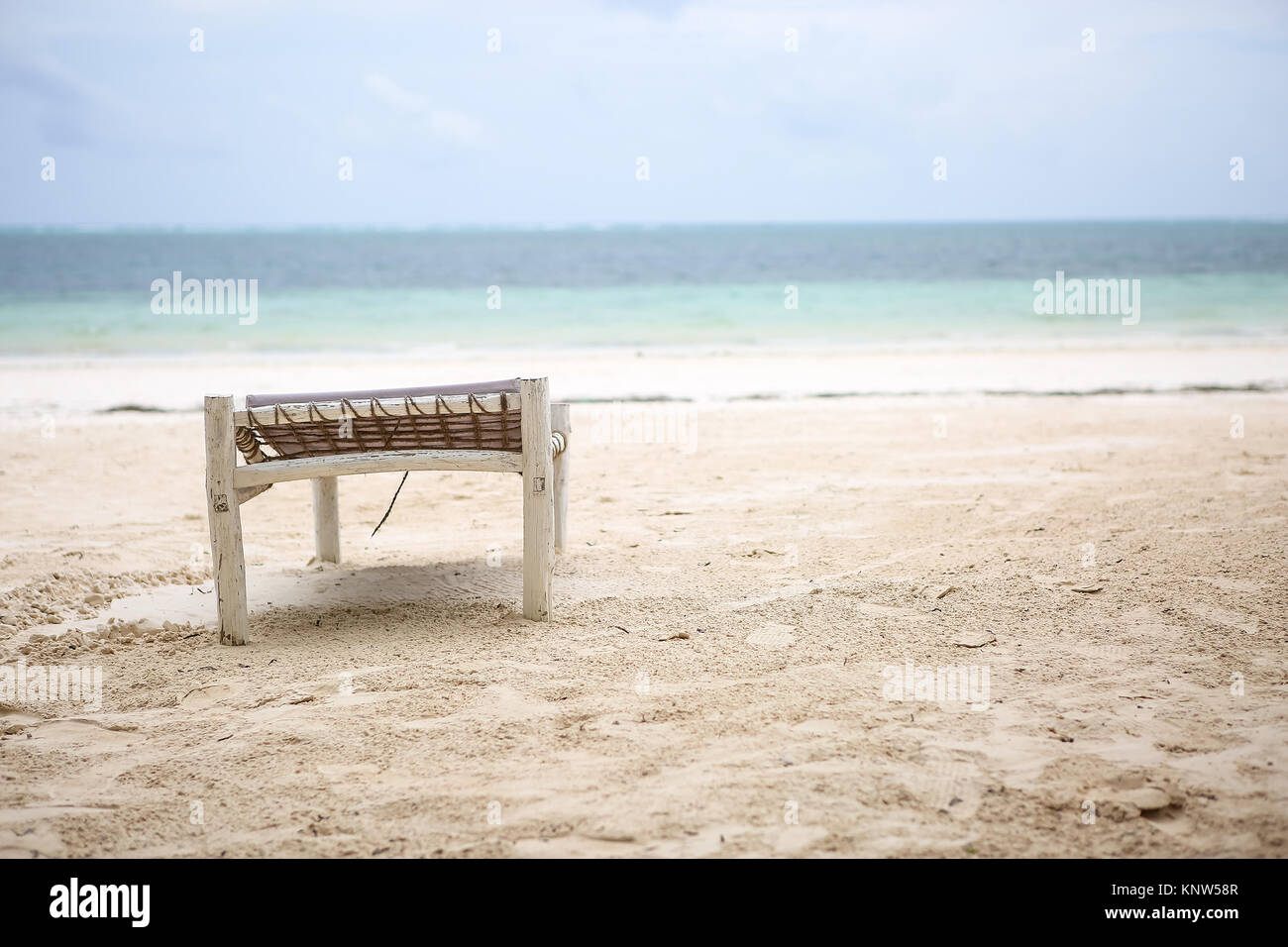 Beach with sun loungers and a place for rest at sunset Stock Photo - Alamy