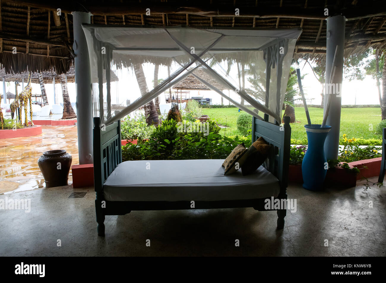 Beach with sun loungers and a place for rest at sunset Stock Photo - Alamy
