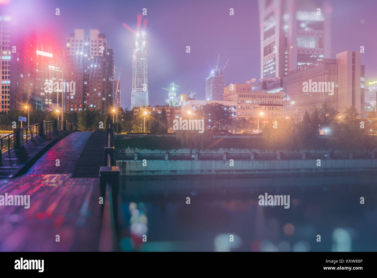 footbridge with cityscape in background at night in Beijing,China Stock ...