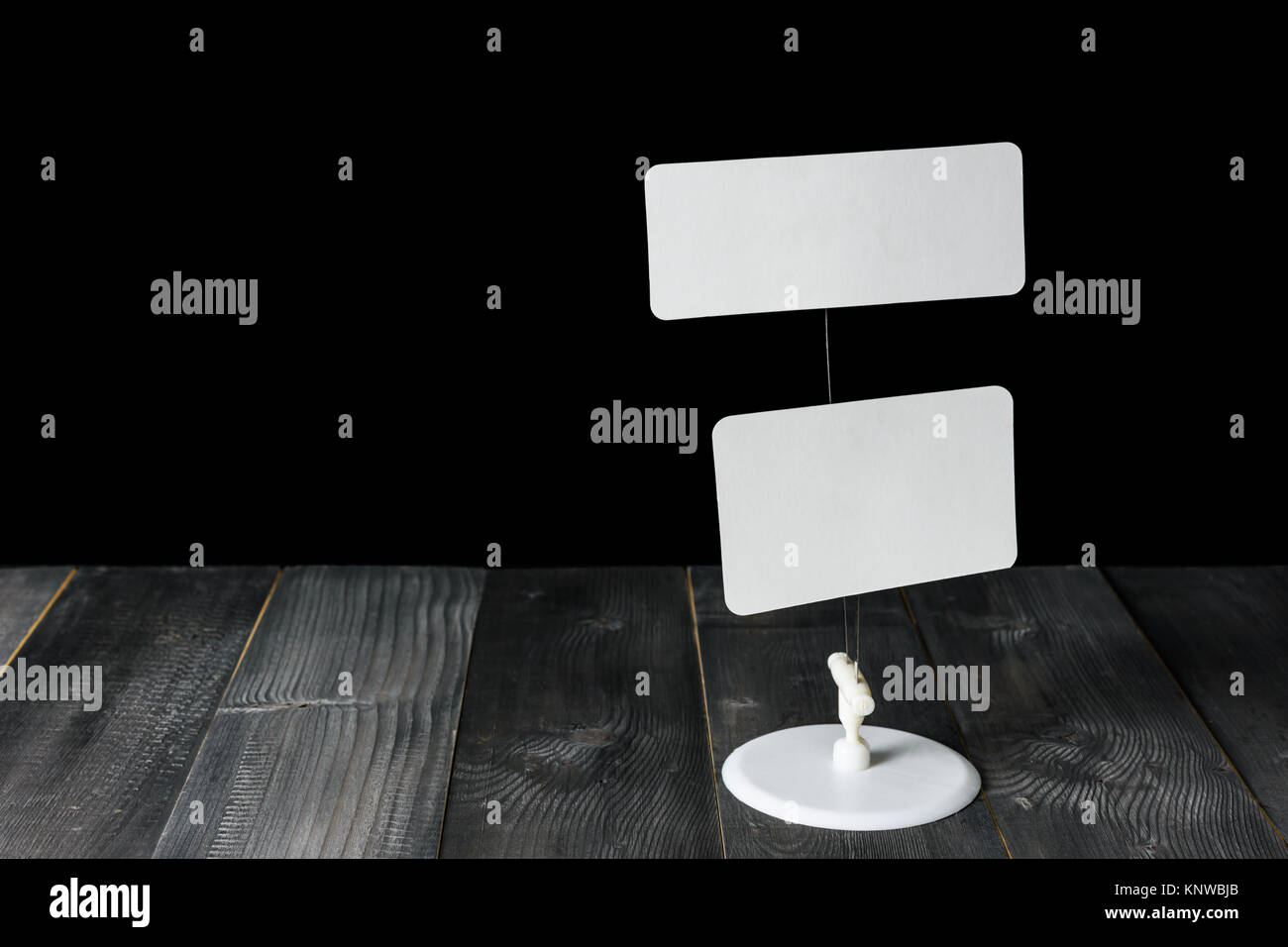 Double white label stand on the wooden table and copy space Stock Photo ...