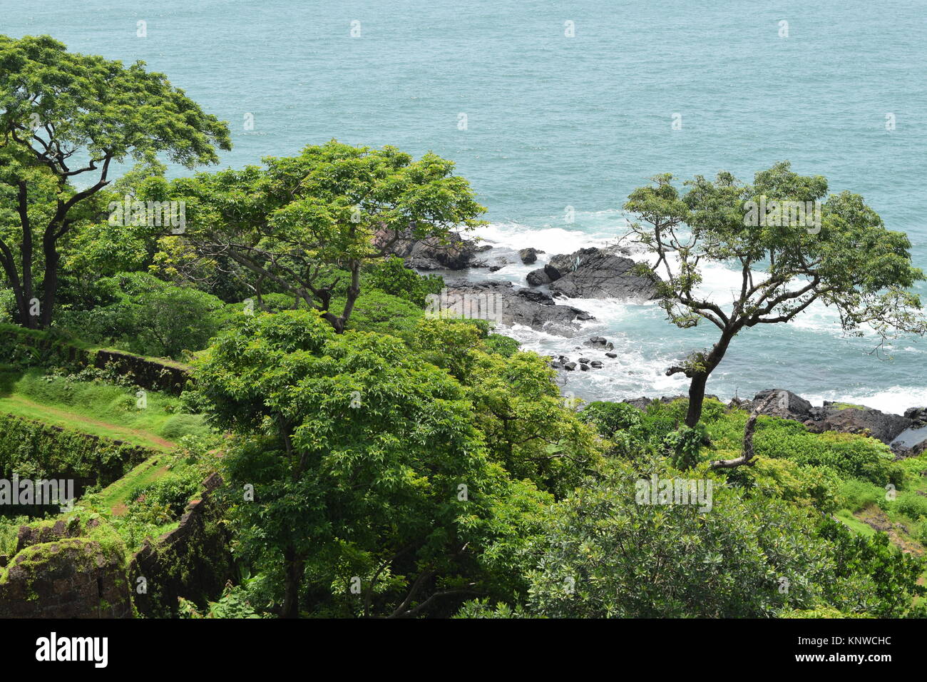 Sea view from mountain. Sea, trees and mountain. Rocky sea view with ...