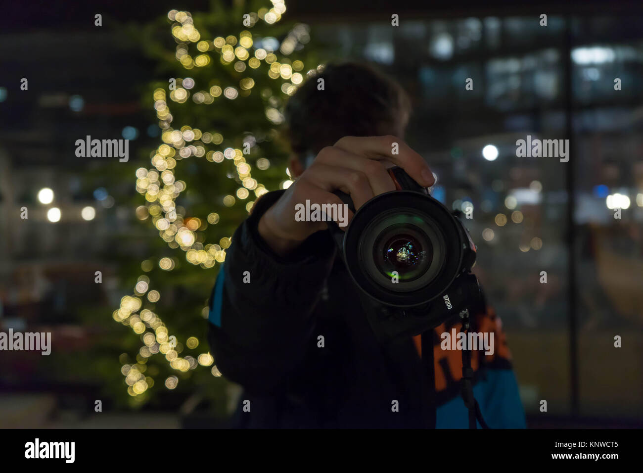 Camera in front with blurry background Stock Photo - Alamy