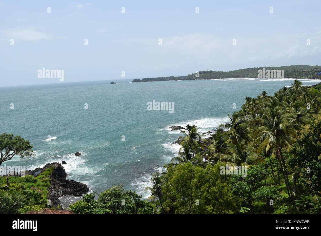 Sea view from mountain. Sea, trees and mountain. Rocky sea view with ...