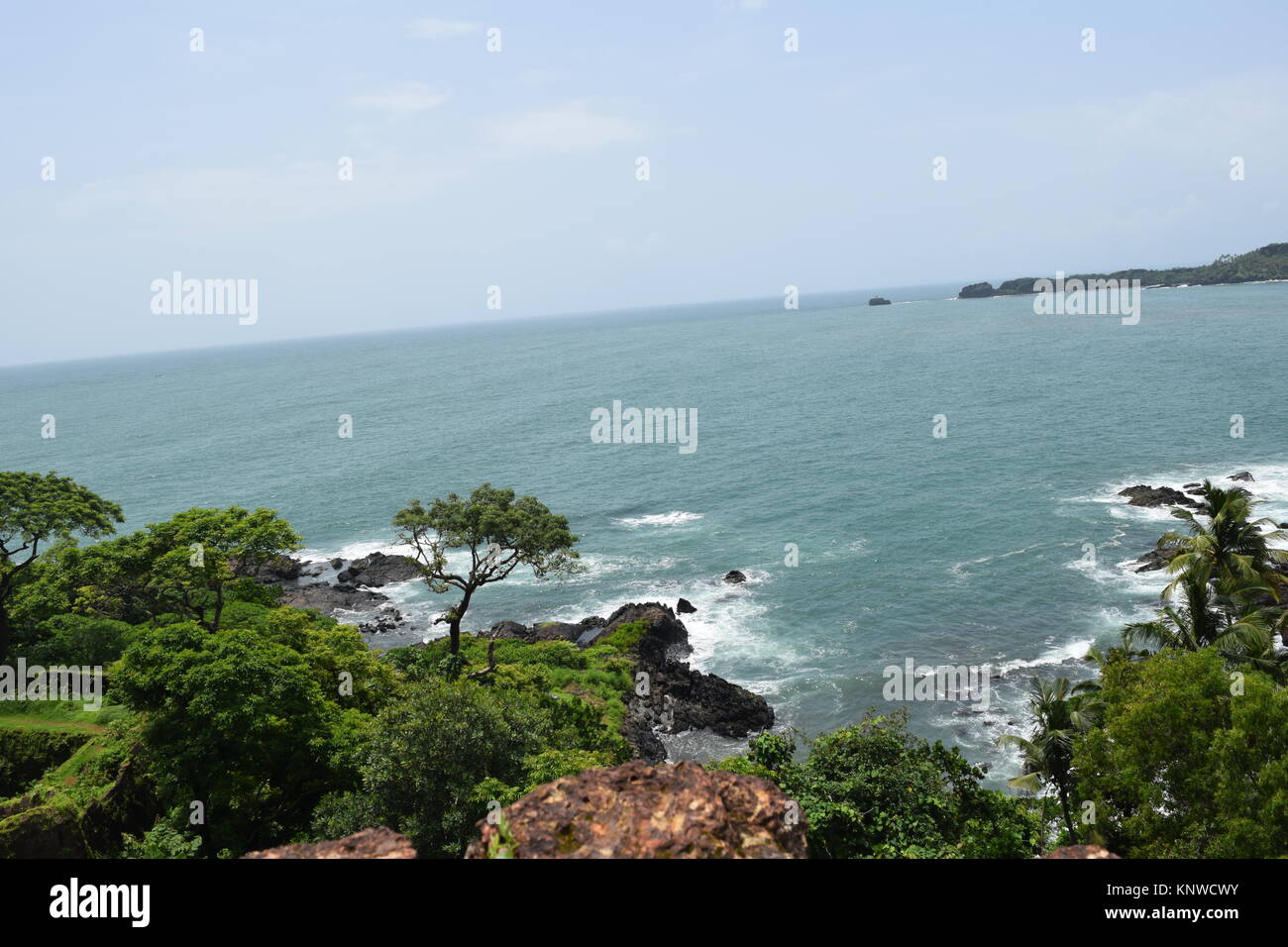 Sea view from mountain. Sea, trees and mountain. Rocky sea view with ...