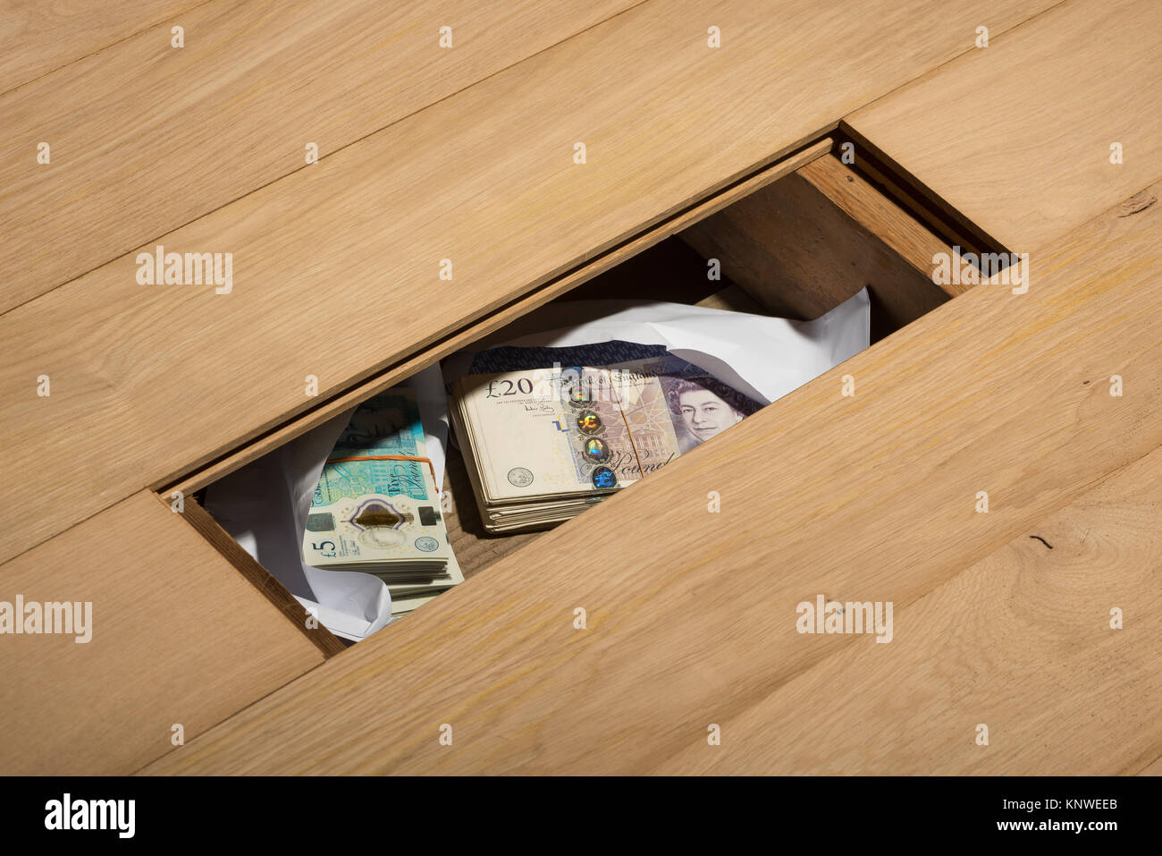 Money hidden under floorboards hi-res stock photography and images - Alamy