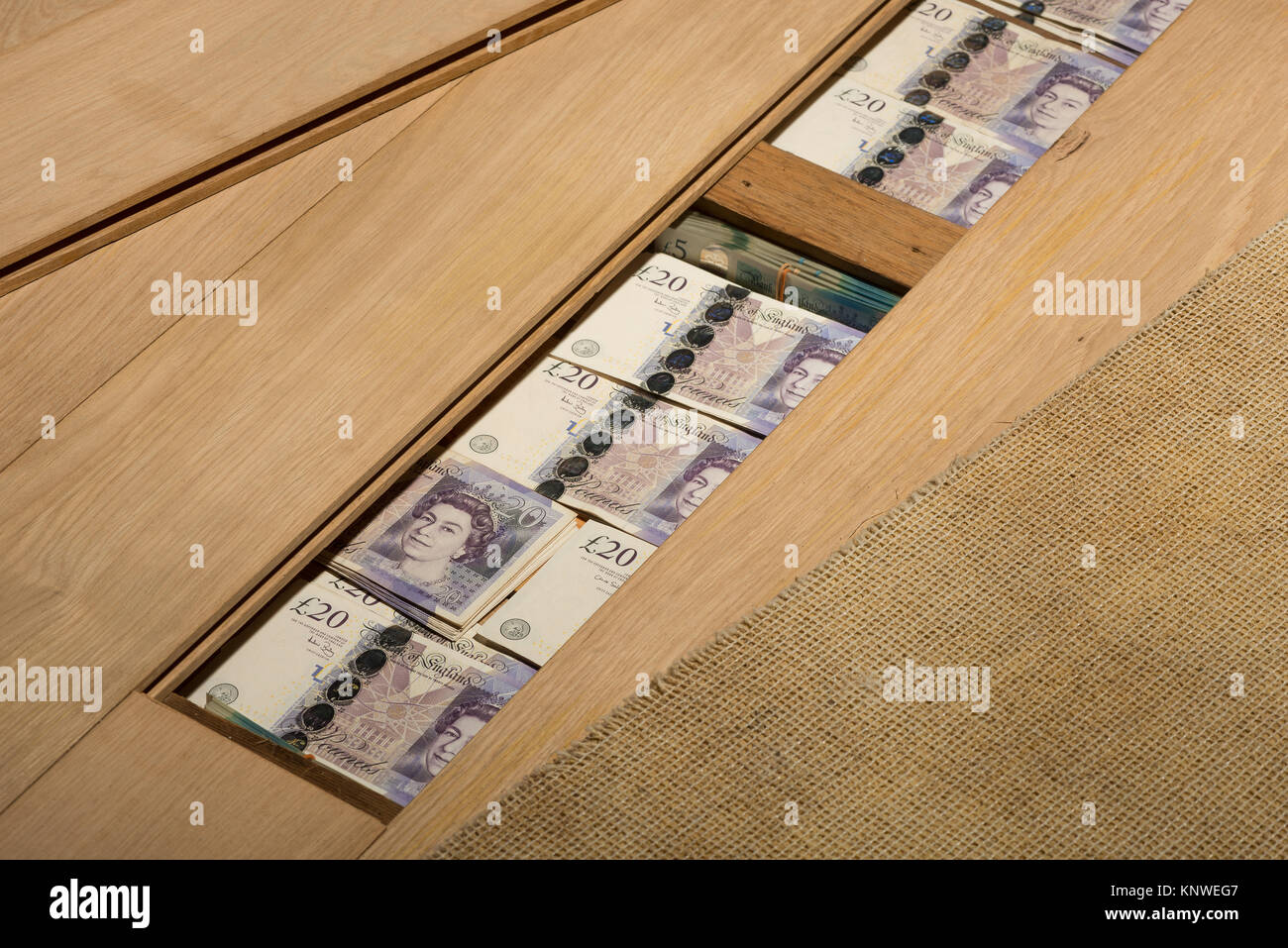 Money hidden under floorboards hi-res stock photography and images - Alamy