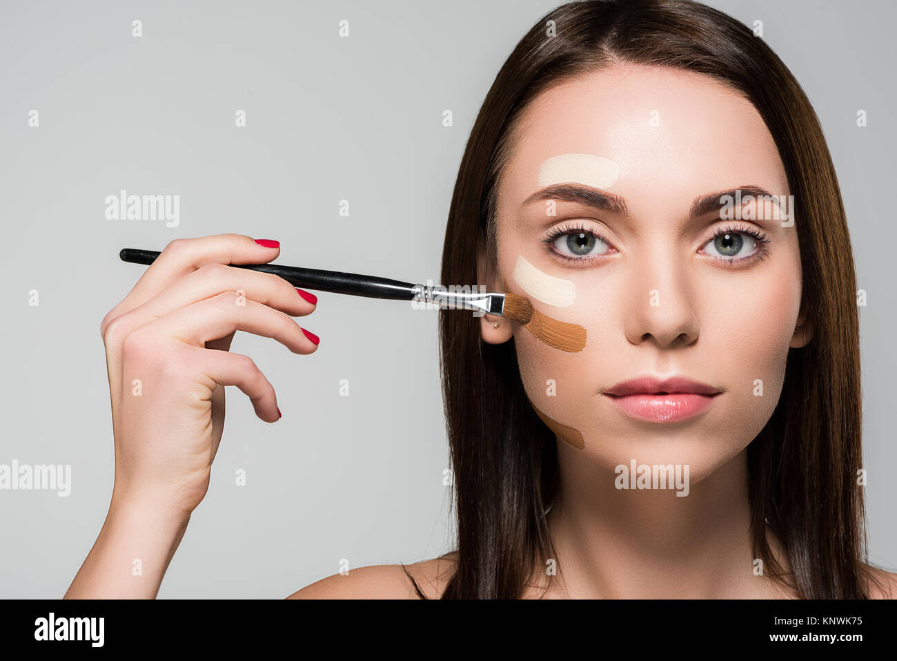 woman with tonal foundation on face Stock Photo - Alamy