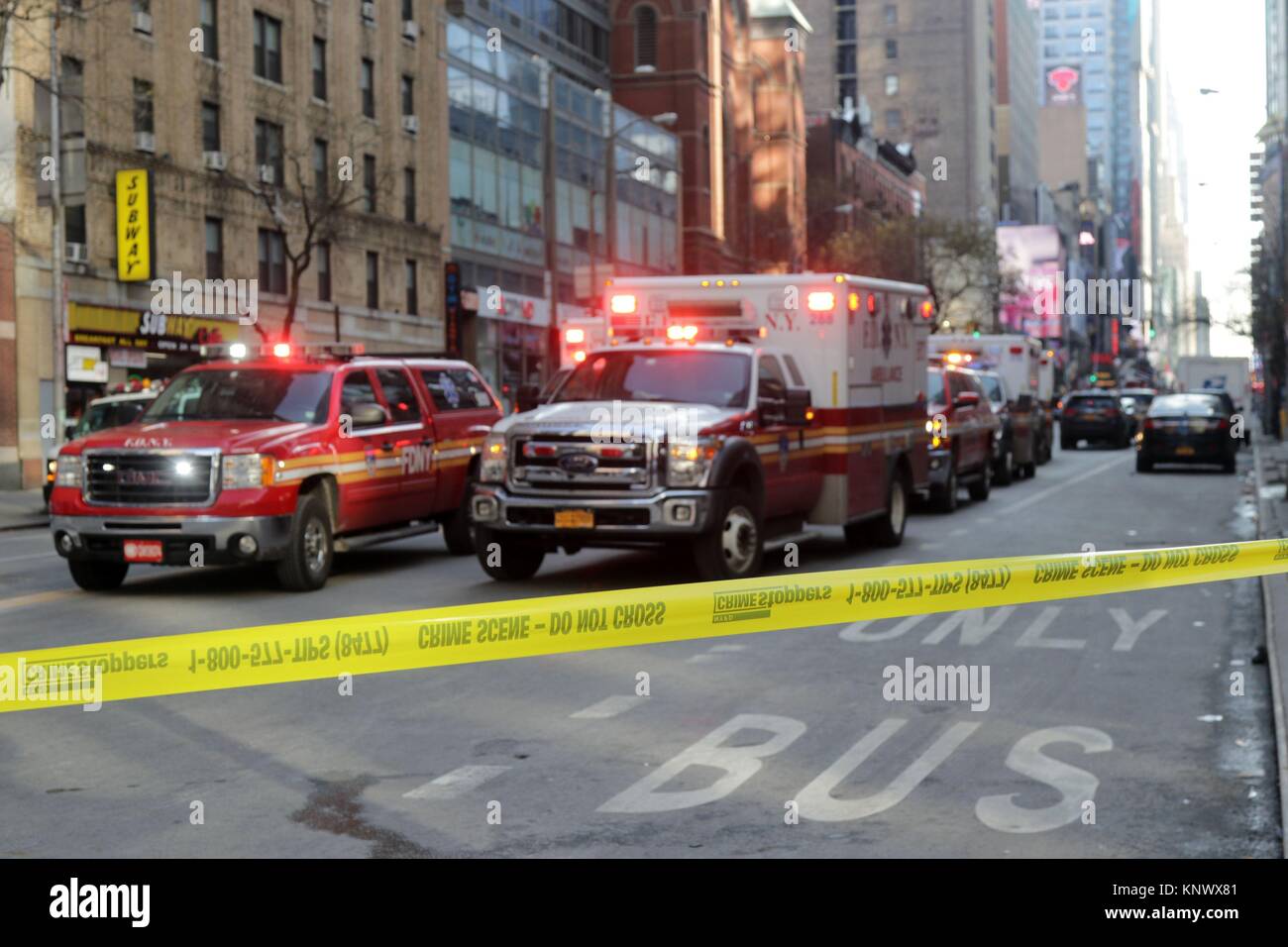 New York, NY, US. 12th. Dec, 2017. Fire services and EMT personnel on ...