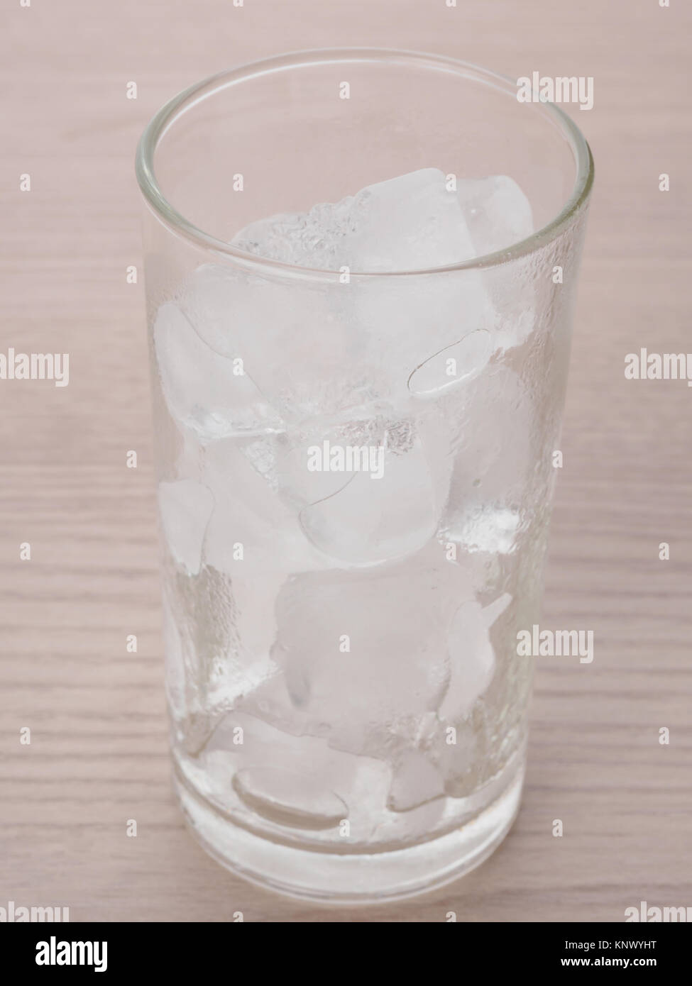 ice cube in glass Stock Photo - Alamy
