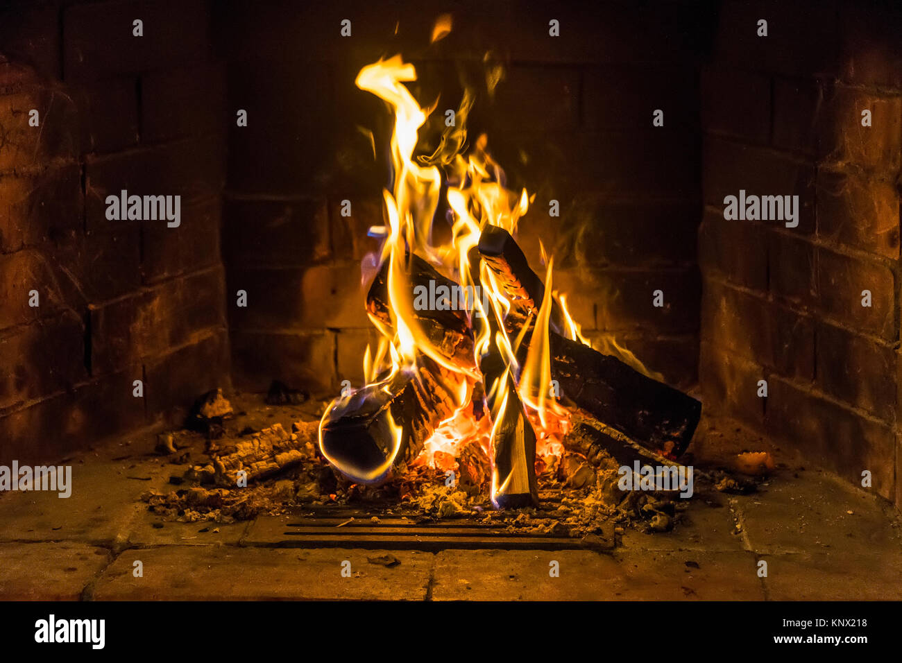 Fire in brick fireplace hi-res stock photography and images - Alamy