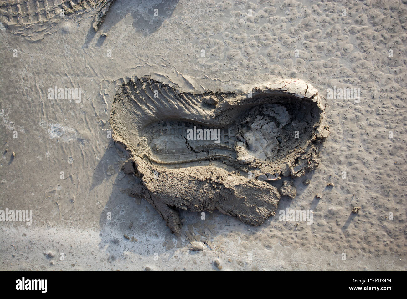 Footstep pattern seen on a concrete background Stock Photo - Alamy