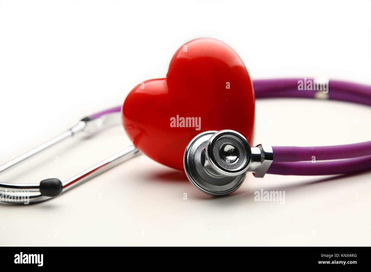 Heart with a medical stethoscope, isolated on white background Stock ...