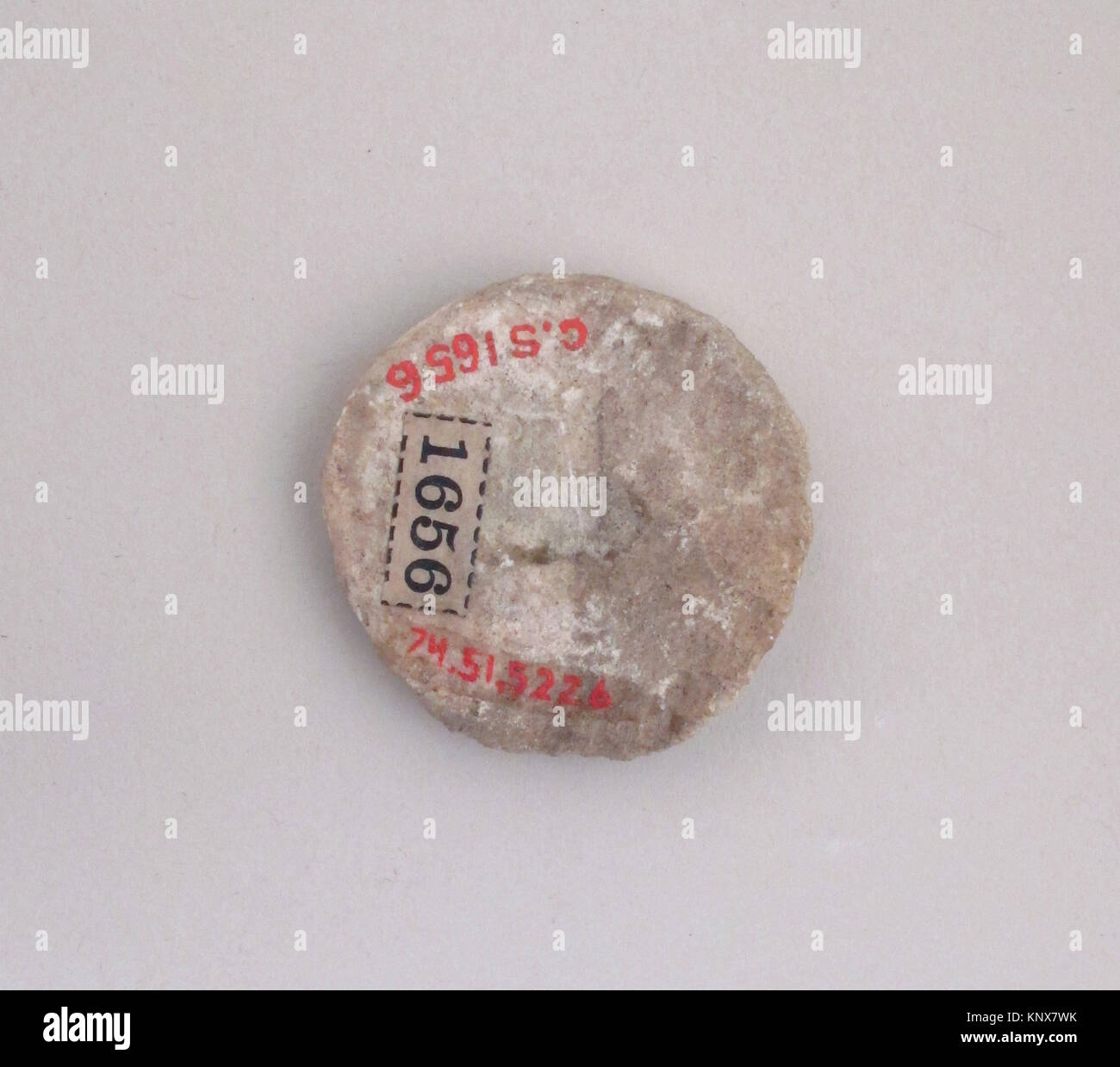 Roundel, disk. Medium: Bone ?; Dimensions: Diameter: 1 5/16 x 3/16 in ...