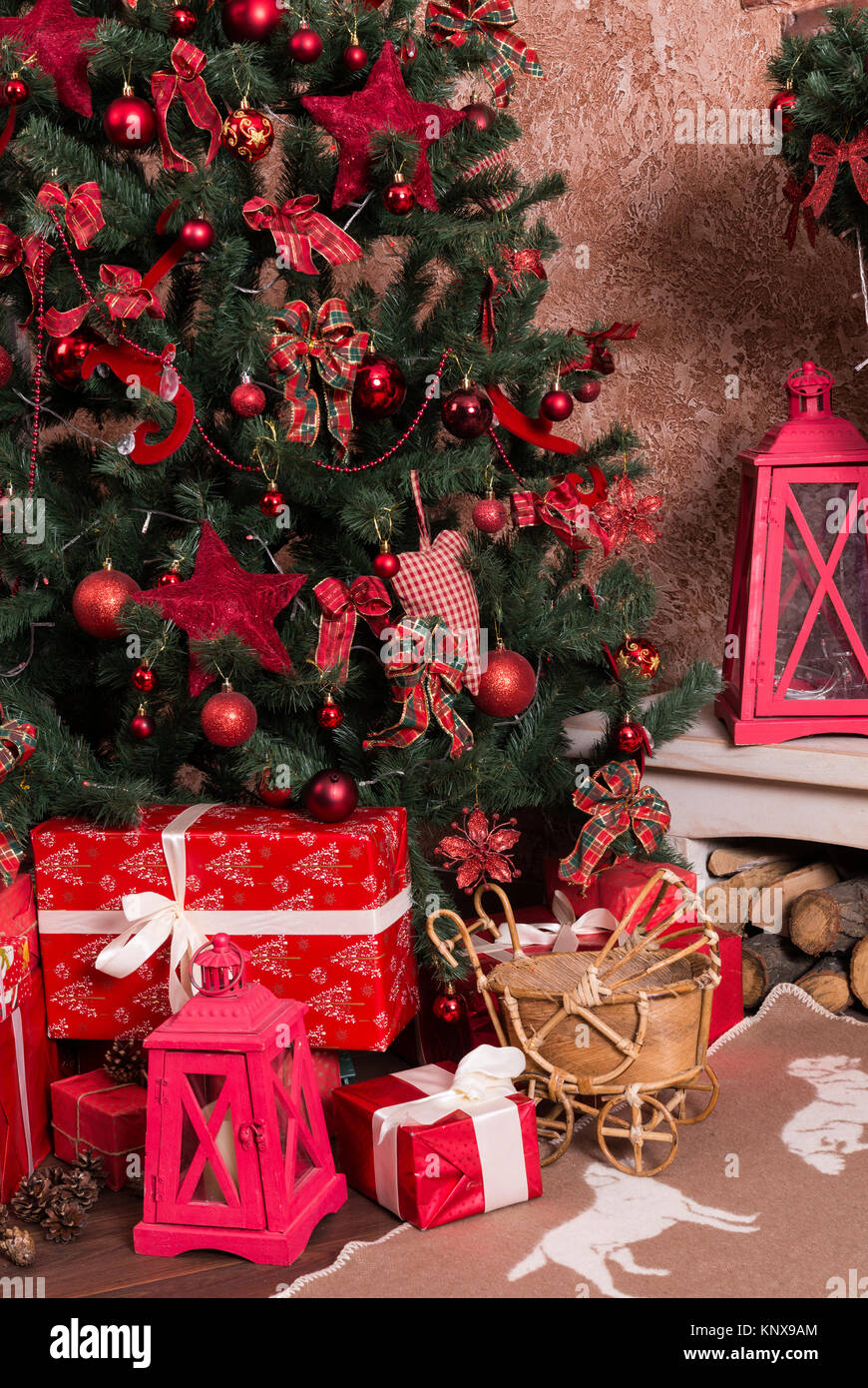Many boxes with Christmas presents under the Christmas tree Stock Photo ...