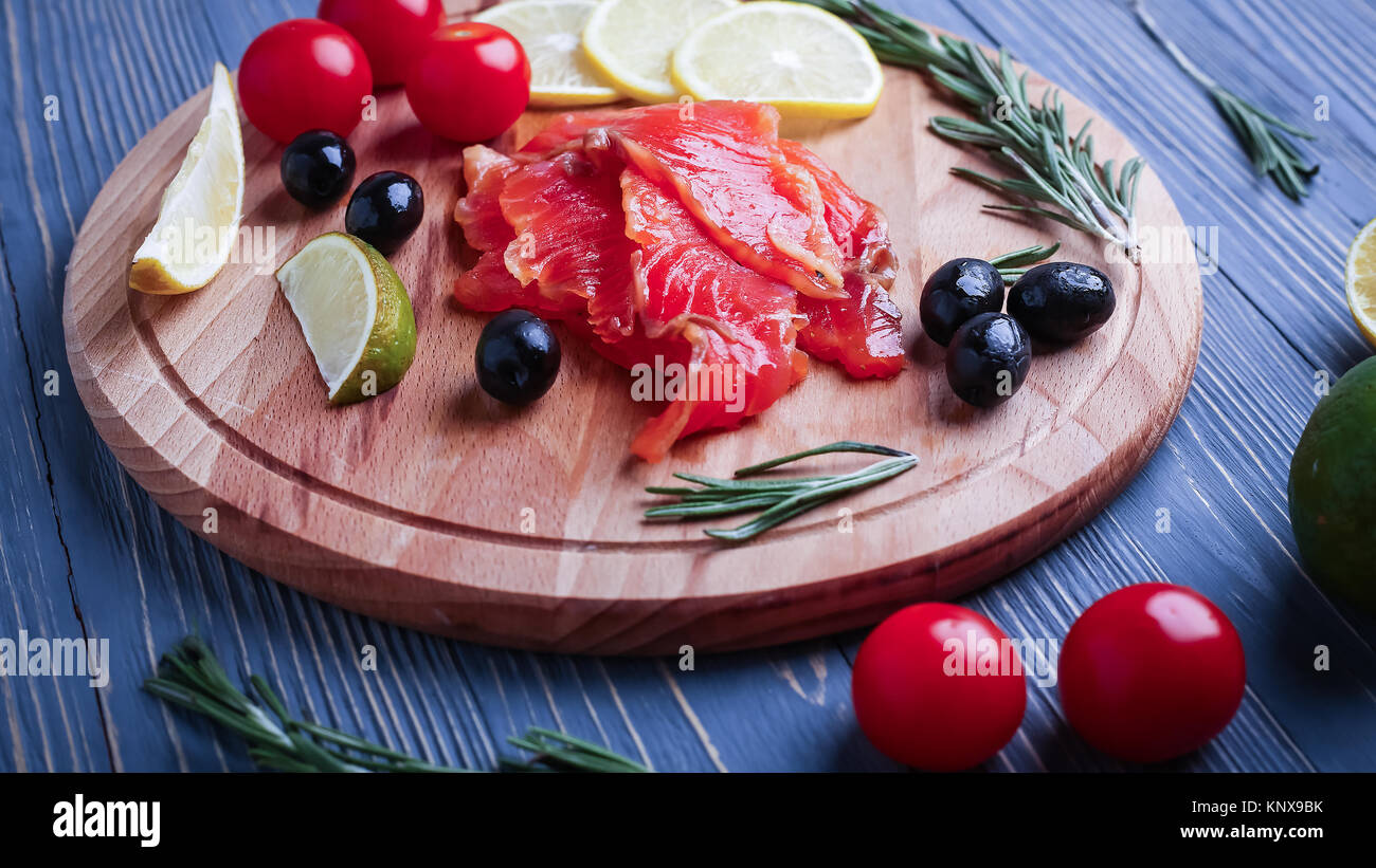 Fish sliced on the table for meals Stock Photo - Alamy