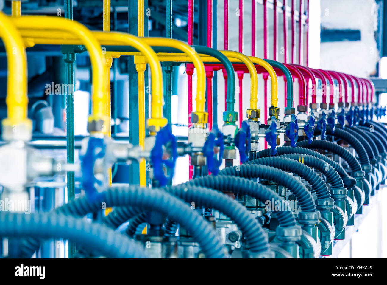 steel pipelines and cables in a plant,Industrial zone Stock Photo - Alamy