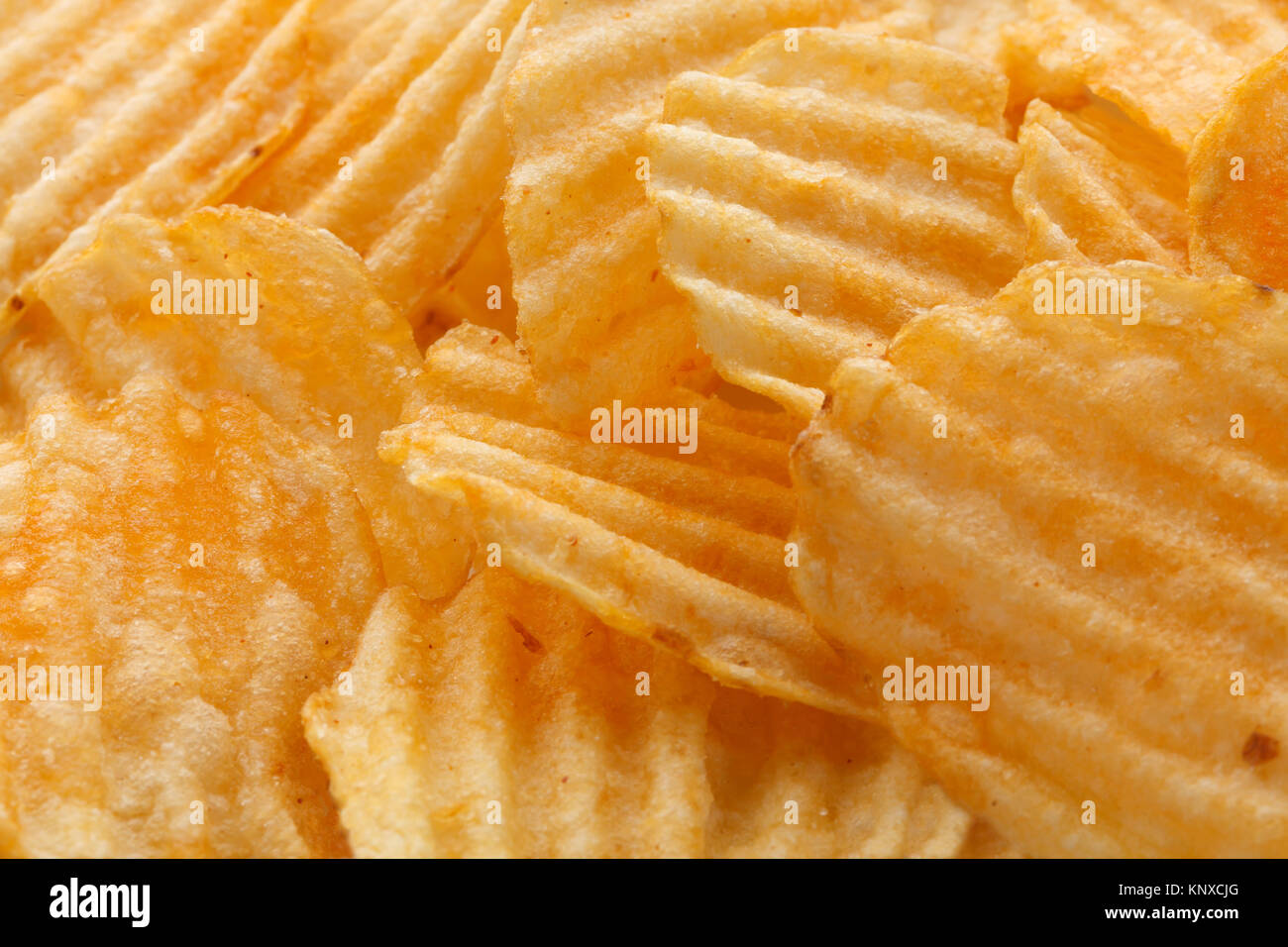 Chips food background Stock Photo - Alamy