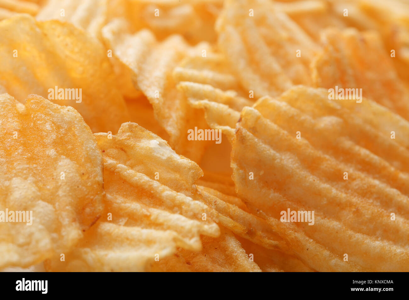 Chips food background Stock Photo - Alamy