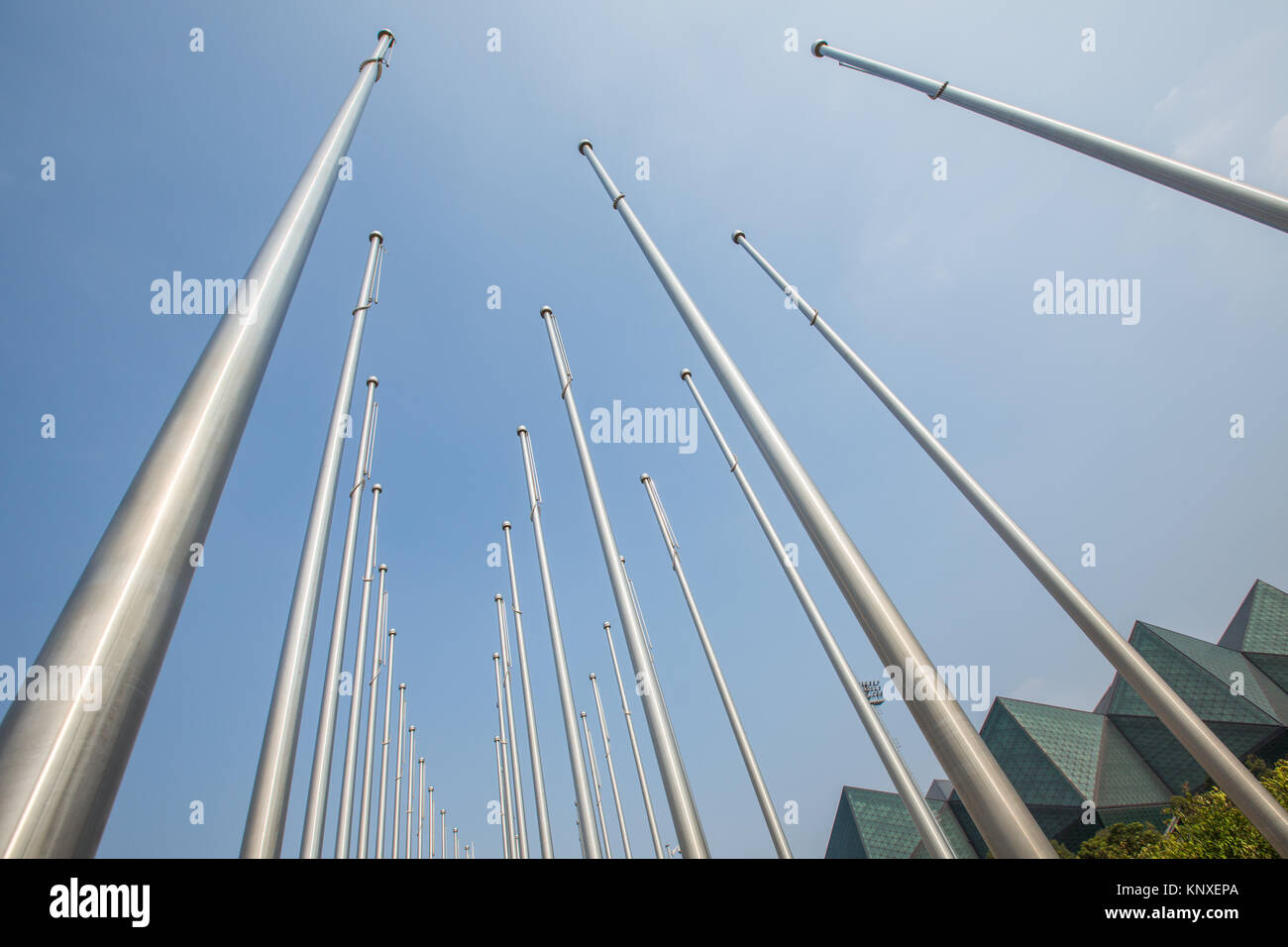 Row of flagpole in empty square,Tianjin,China Stock Photo - Alamy