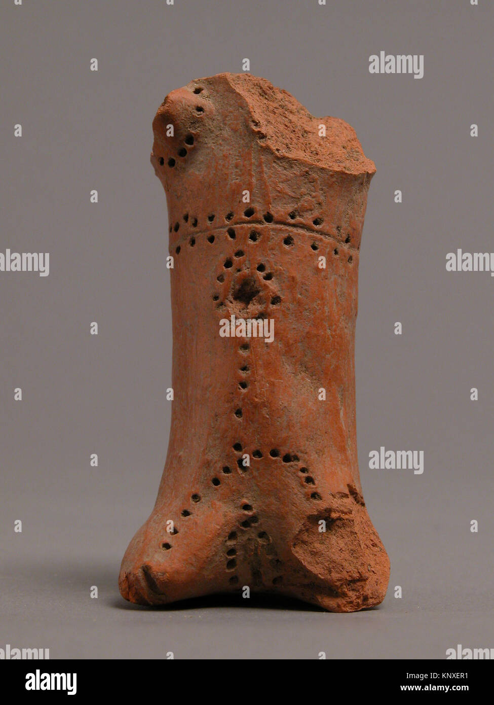 This object is a fragment of an ancient figure, illustrating historical ...