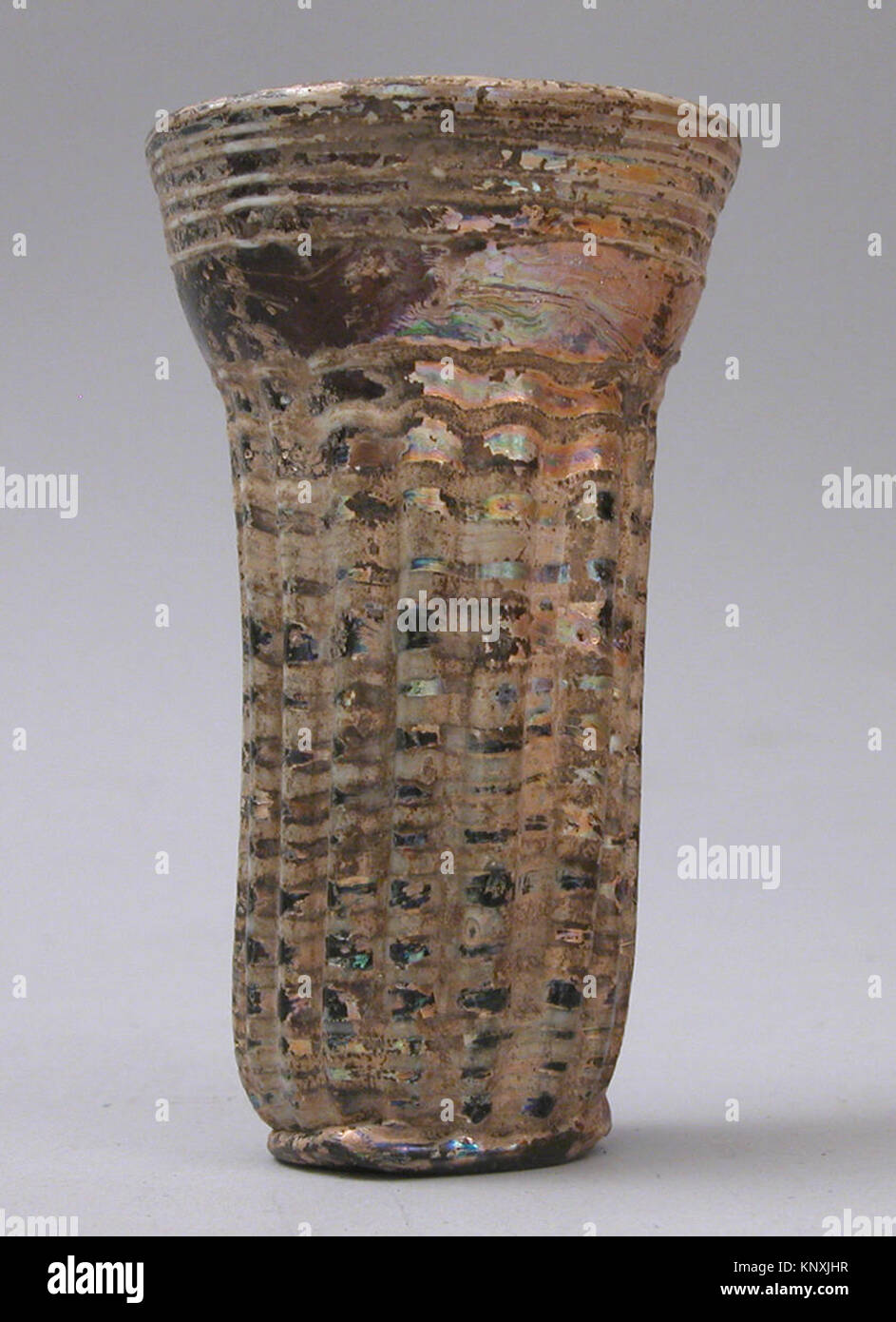 A medieval Syrian glass beaker from the 13th-14th century, mold-blown ...