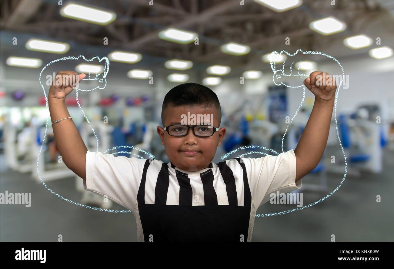 Asian strong children on Abstract blurred photo of fitness gym ...