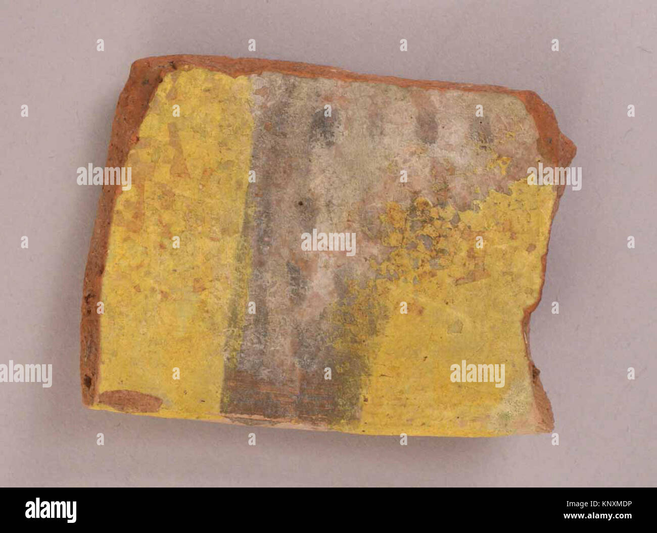 Museum-preserved glazed earthenware fragment from 8th–9th century ...