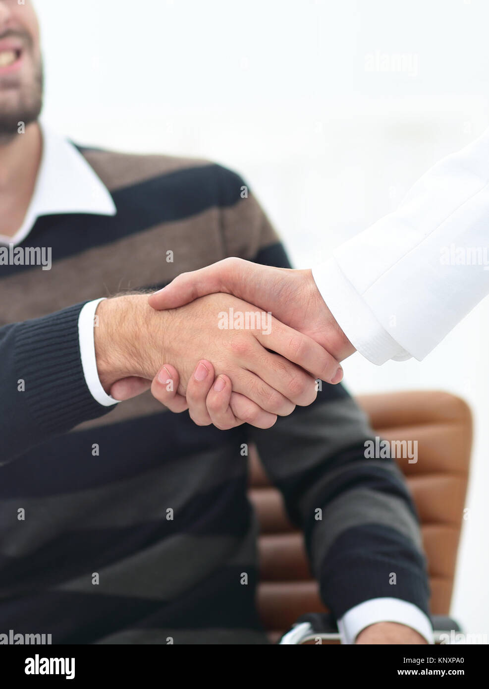 handshake between colleagues in the workplace Stock Photo - Alamy