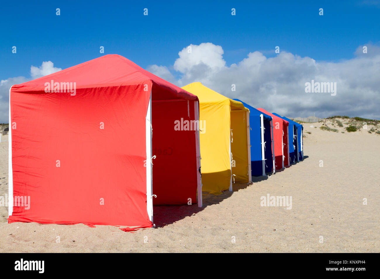 Colored tents in the beach Stock Photo - Alamy