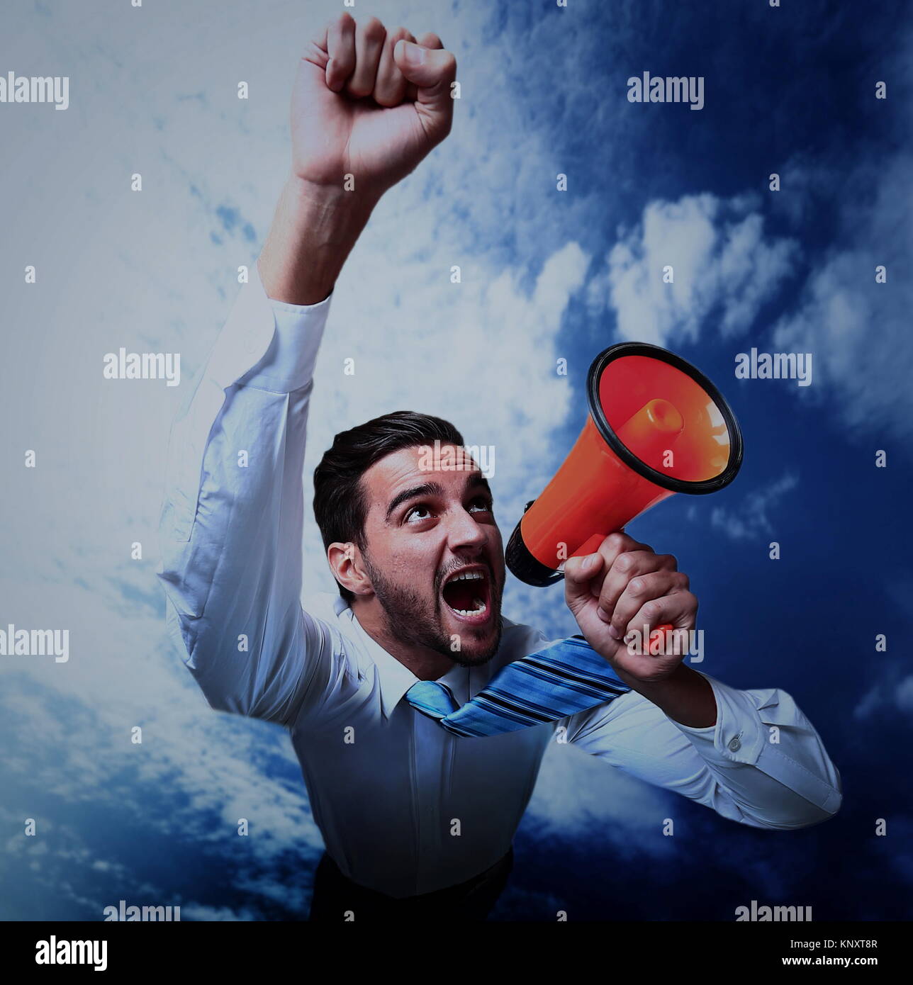 businessman flying and shouting through megaphone Stock Photo - Alamy