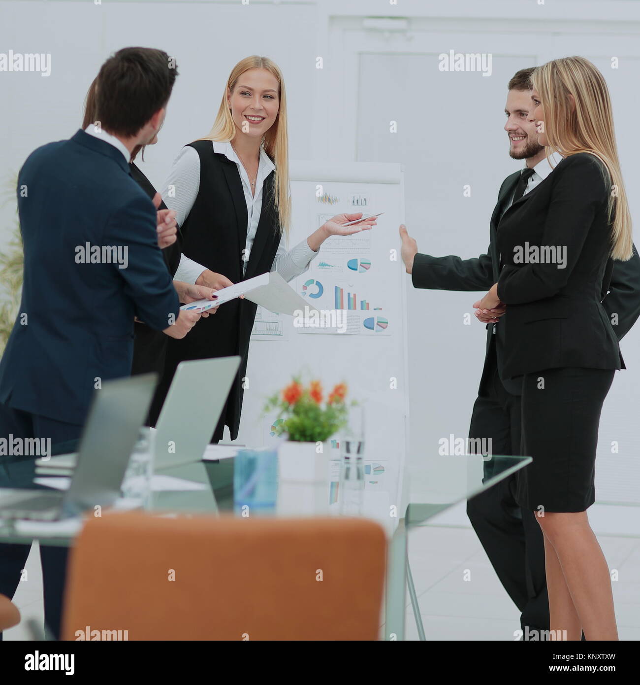 Business woman making a presentation at the office Stock Photo - Alamy