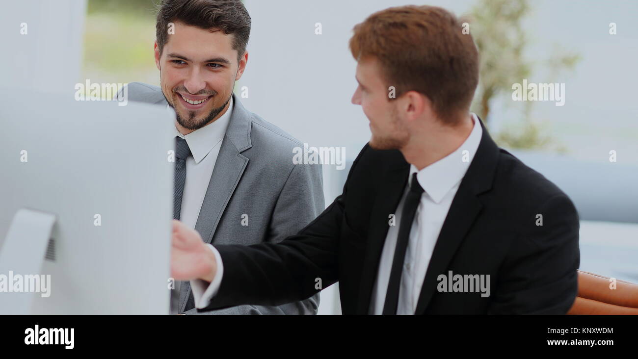 Business men discussing together business plans Stock Photo - Alamy
