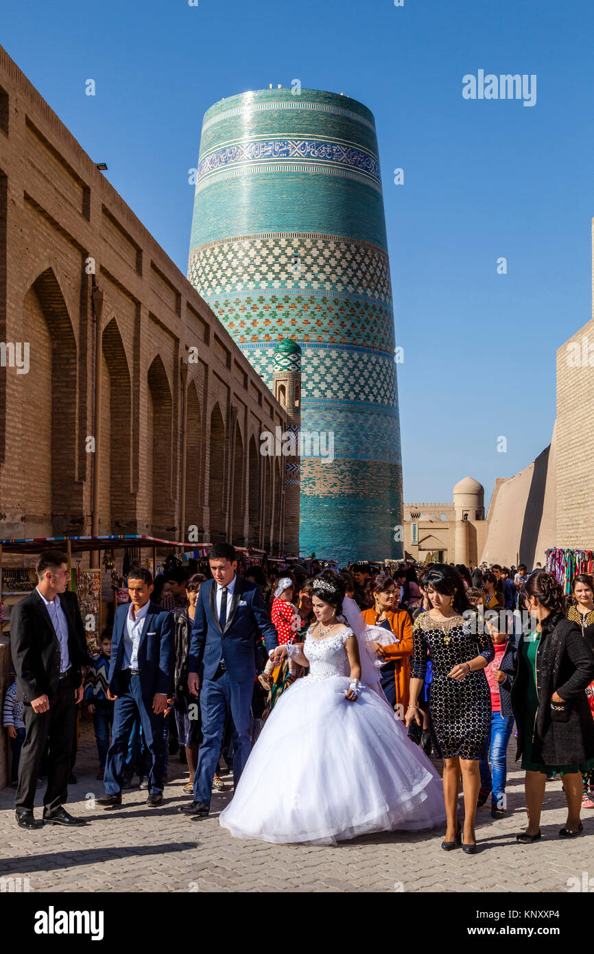 A Young Uzbek Couple Walk Through The Streets Of Khiva After Getting ...