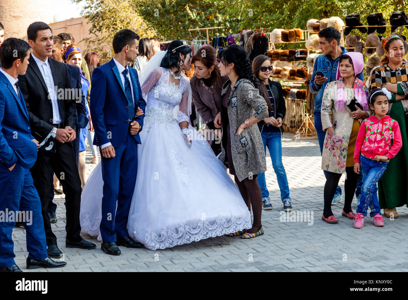A Young Uzbek Couple Walk Through The Streets Of Khiva After Getting ...