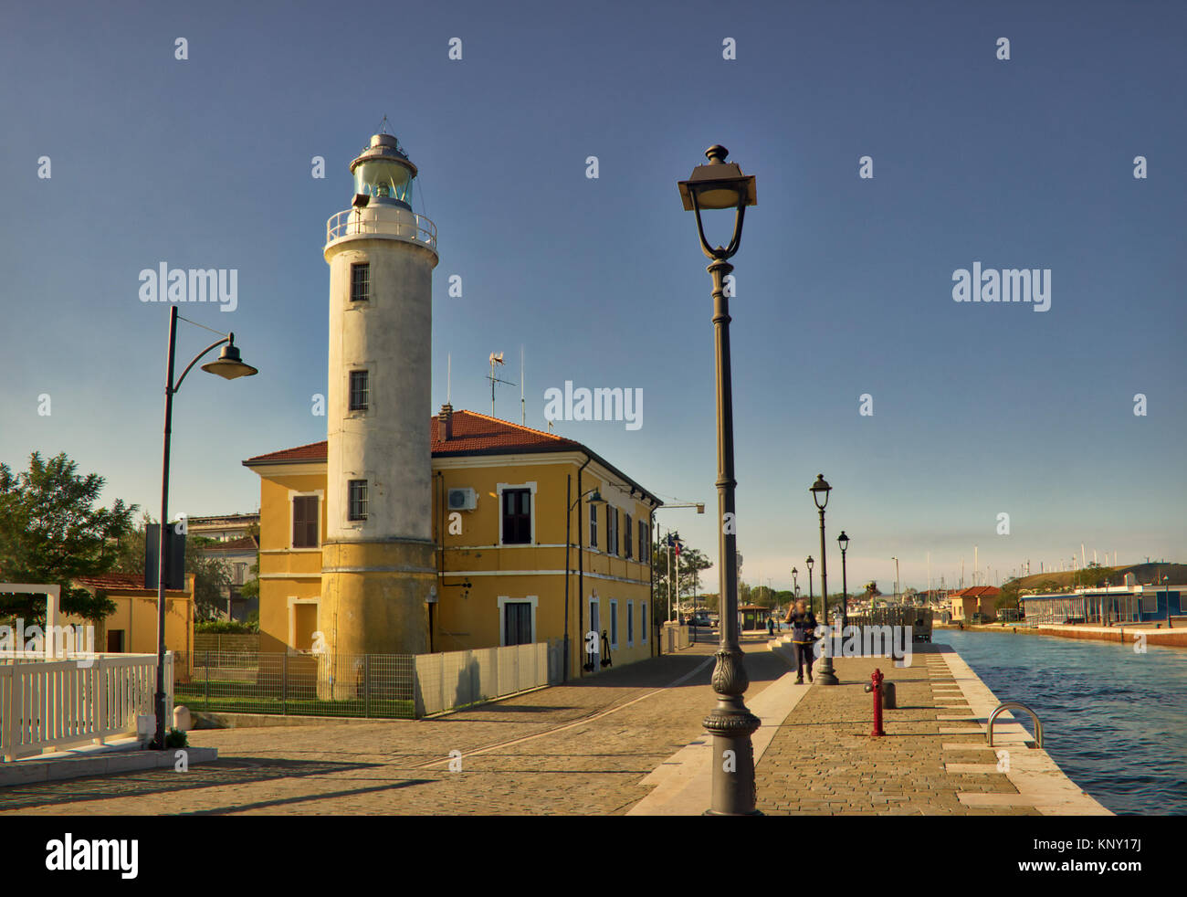 lighthouse on old town cozy sea port on sunny day Stock Photo - Alamy