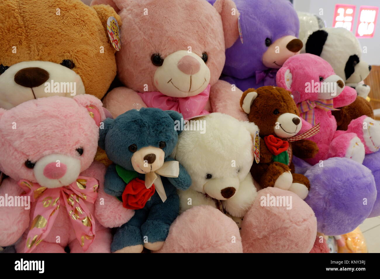 Colorful stuff toys on display Stock Photo - Alamy
